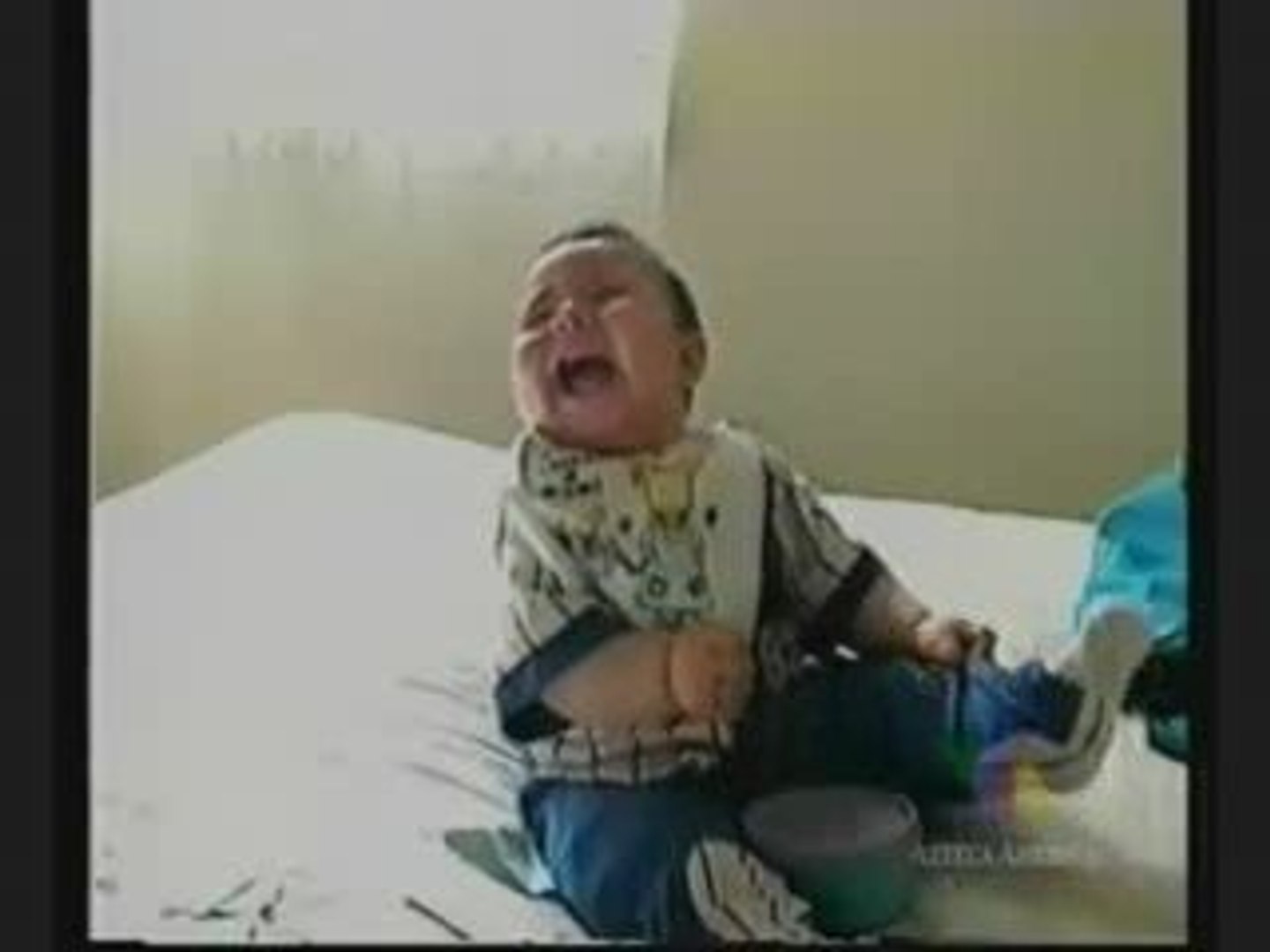 Laughing Baby Falls Gif