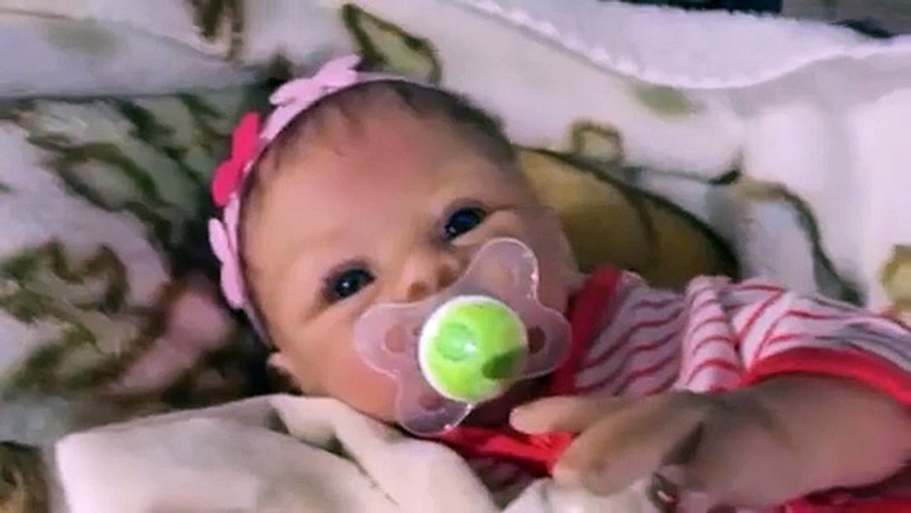 Ashton Drake Snuggle Bunny gets dressed up - Dailymotion Video