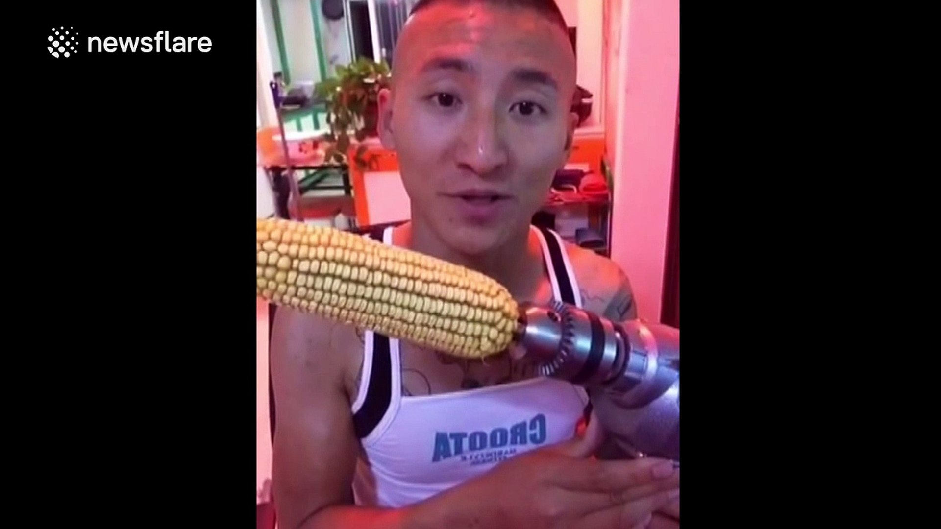 Man Eating Corn On The Cob