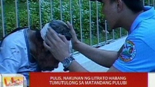 UB: Pulis, nakunan ng litrato habang tumutulong sa matandang pulubi sa ...