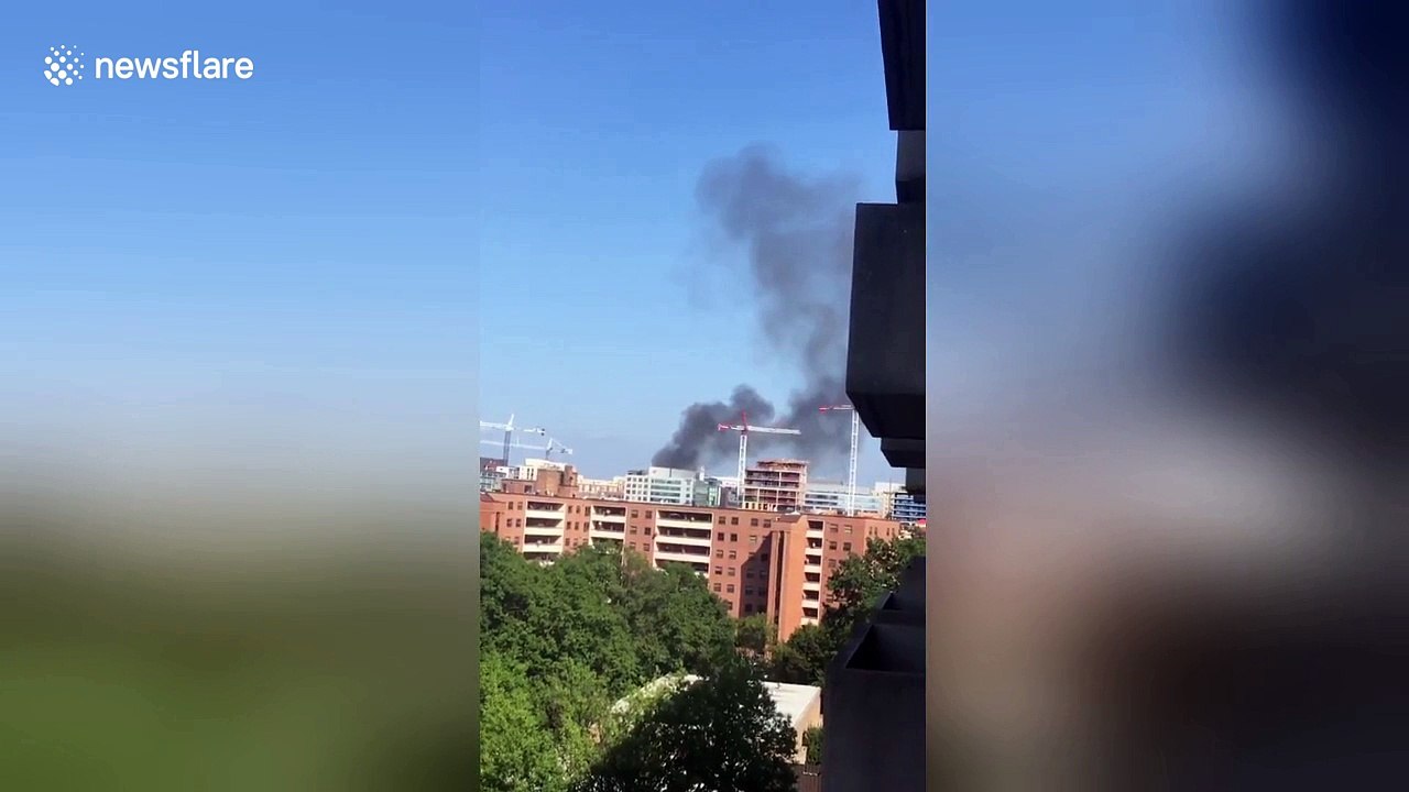 Smoke pours out of Arthur Capper Senior Apartments near DC's Navy Yard ...