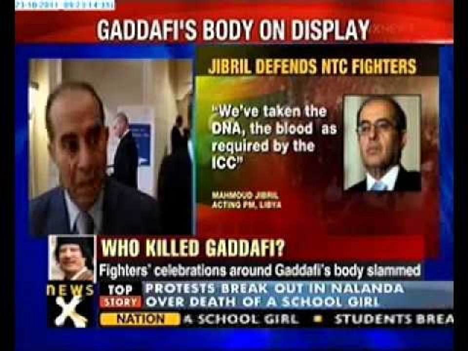 Gaddafi's dead body on public display at shopping centre - video ...