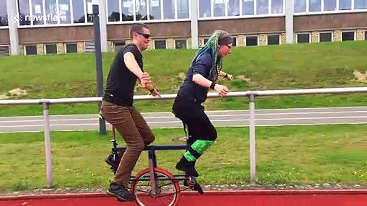 Duo attempt to ride two-seated unicycle in Germany - video Dailymotion