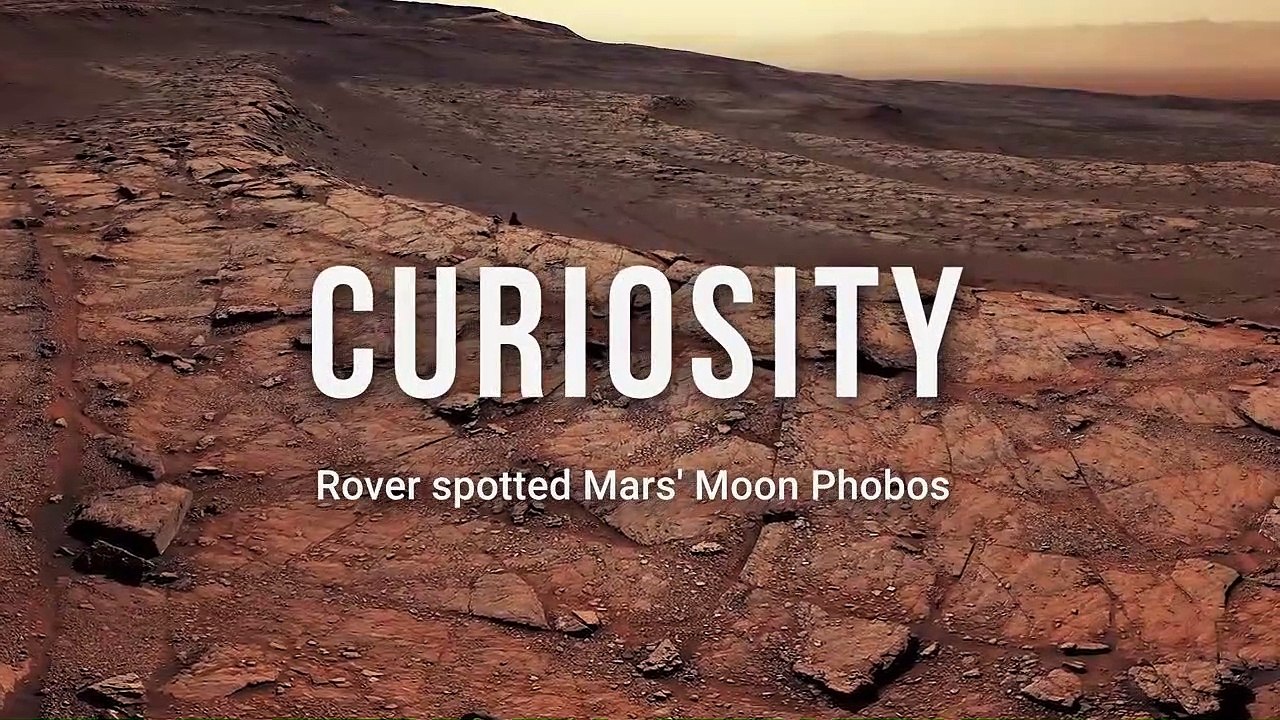 Mars Moon Phobos in cloudy sky captured by Curiosity Rover - video ...