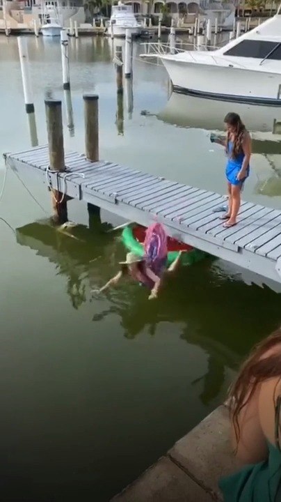 Woman Falls off Dock and Splashes Into Water While Trying to Step Onto ...