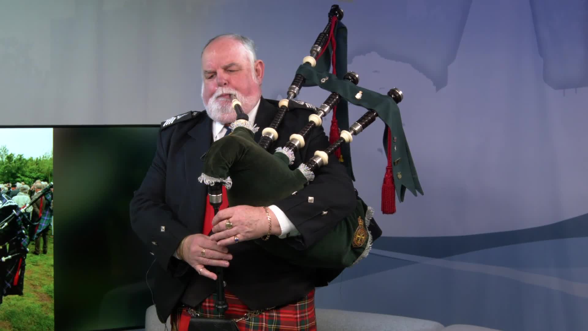 Alex Burt plays the bagpipes