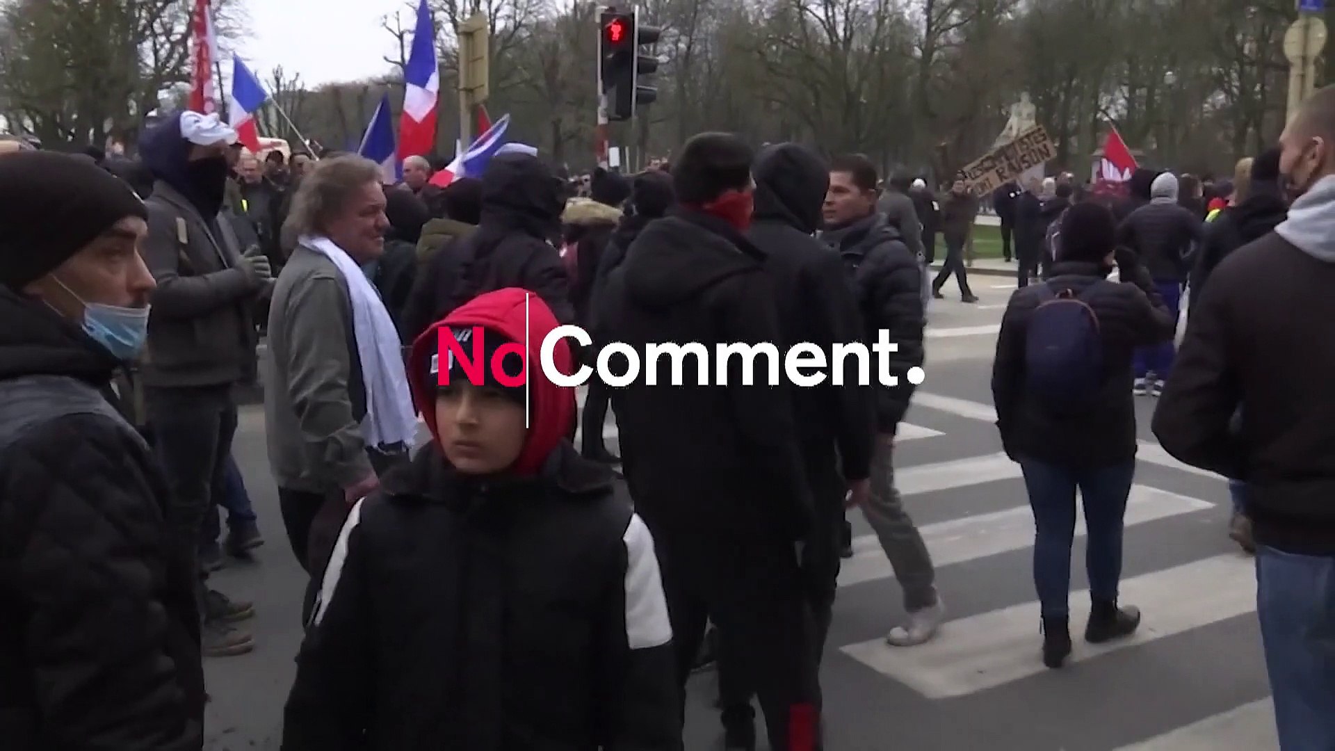 Protesters attack video team filming Belgian march against vaccinations ...