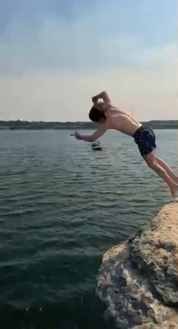 Excited Boy Faces Jumping Off A Cliff Teen Boy Pulled From Water After