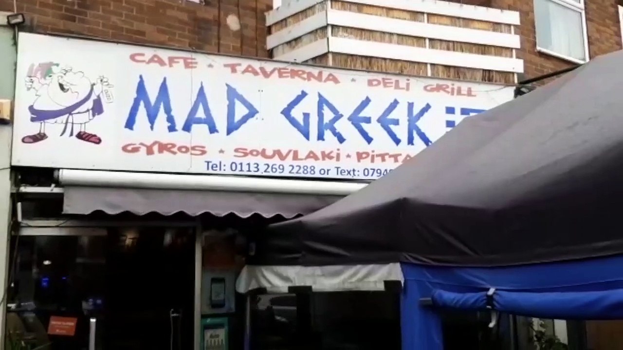 The Mad Greek takeaway is unhappy about new shutters installed by a ...