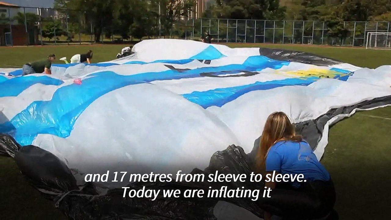 World's largest inflatable football shirt salutes Messi victory - video ...