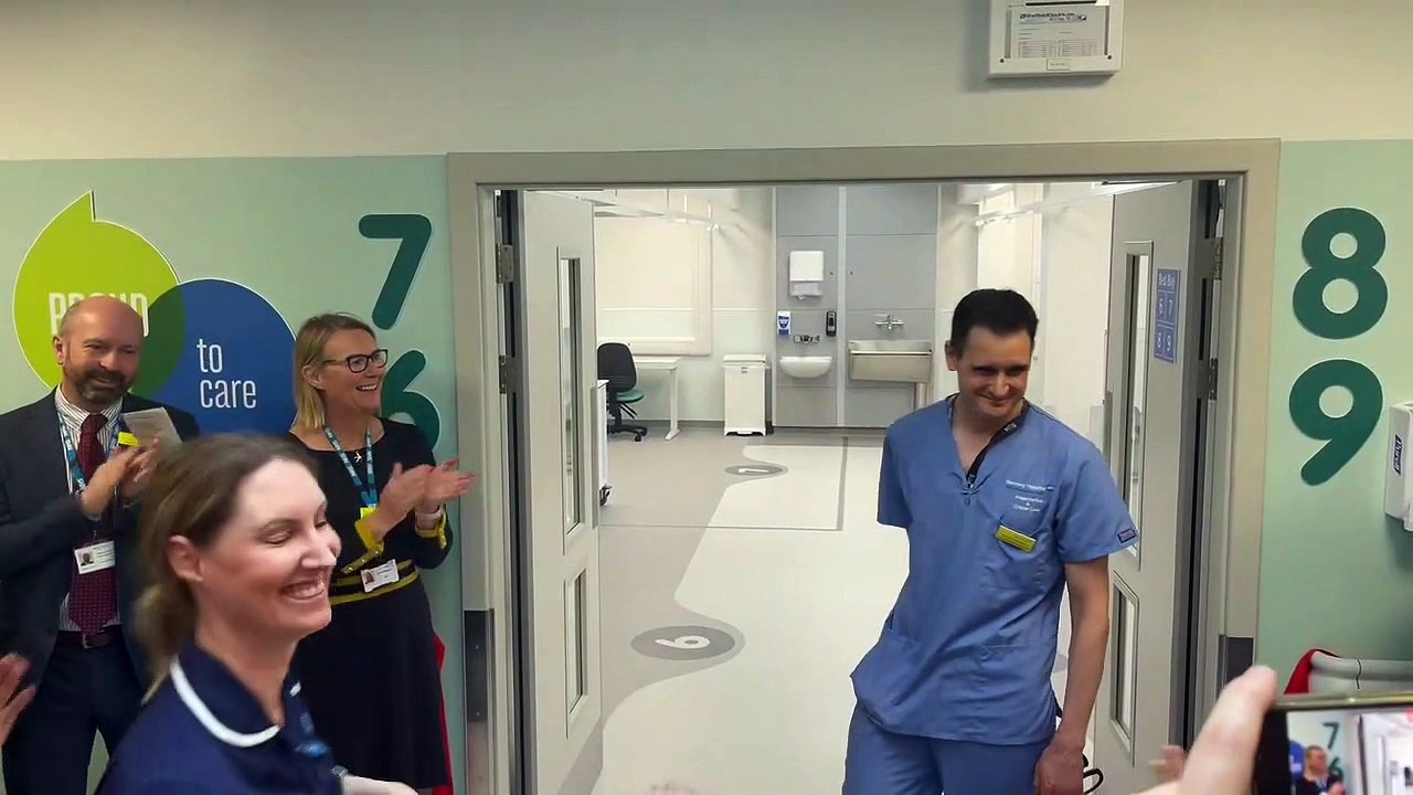 Dr Tim Wenham, lead for intensive care, cutting the ribbon at Barnsley ...