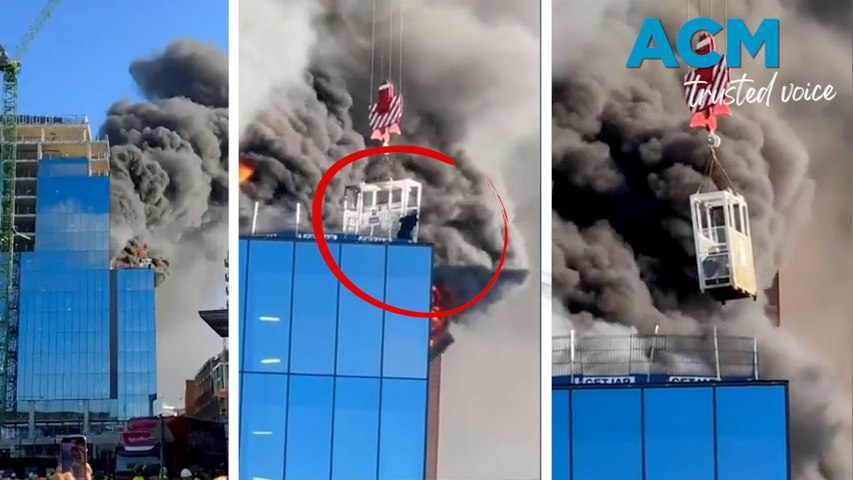 Incredible towering inferno rescue: crane operator saves man from ...
