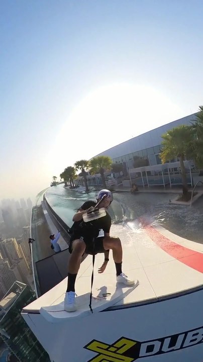 Wakeskating on Dubai Skyscraper's Infinity Pool, then BASE Jumping Over the Edge - video Dailymotion