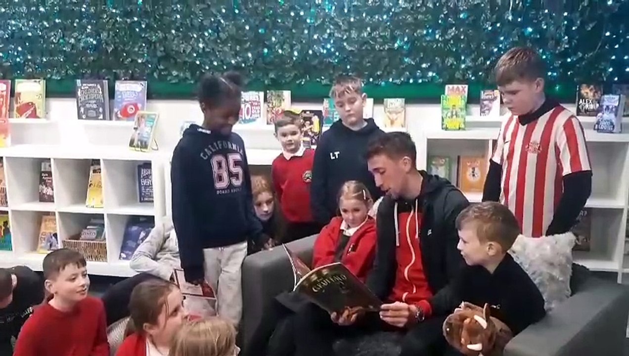 SAFC star Dan Neil goes back to school to open new library and inspire ...