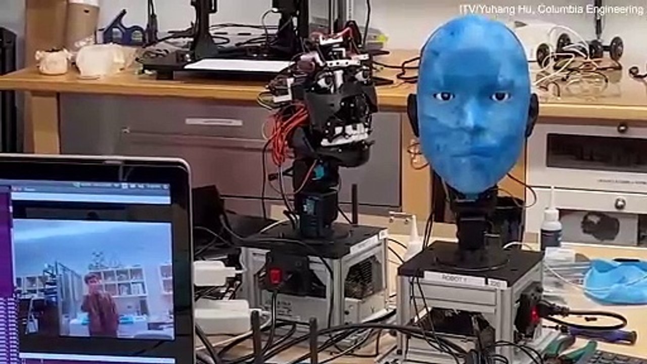 Uncanny Valley! Watch as a creepy humanoid robot mimics a researcher's facial expressions in ...