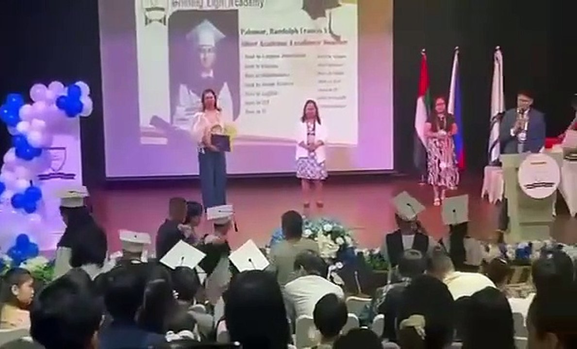 Randolph during his grade school graduation ceremony - video Dailymotion