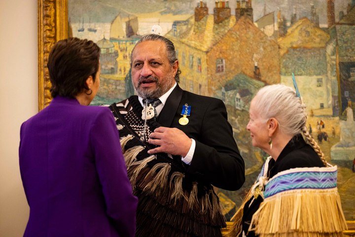 Family give Maori greeting to their dad and husband receiving an OAM at ...