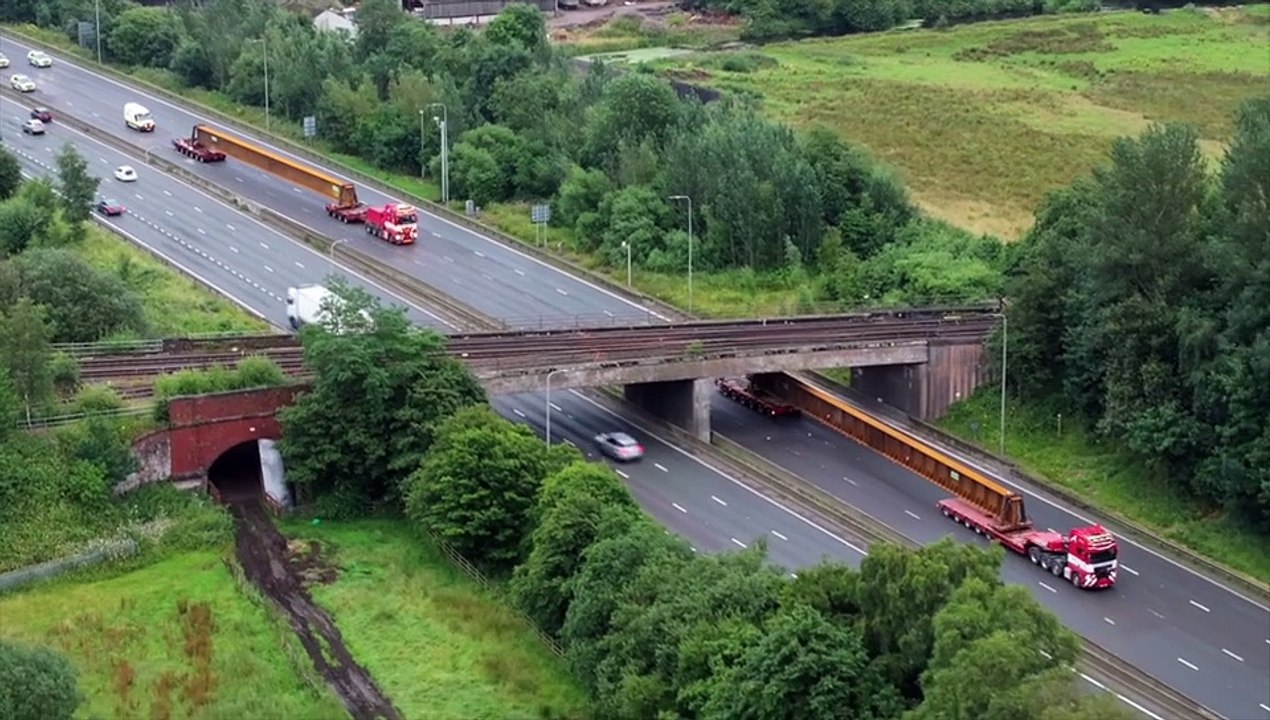 Network Rail reveals drone footage of two 42-metre beams being ...