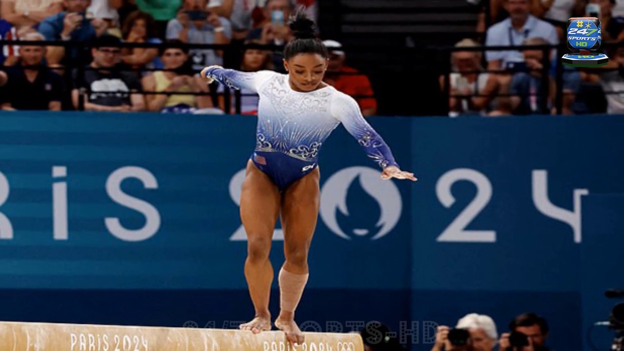 Simone Biles appears to HIT OUT at Olympics crowd after falling off ...