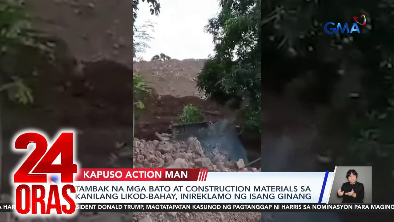 Tambak na mga bato at construction materials sa kanilang likod-bahay ...