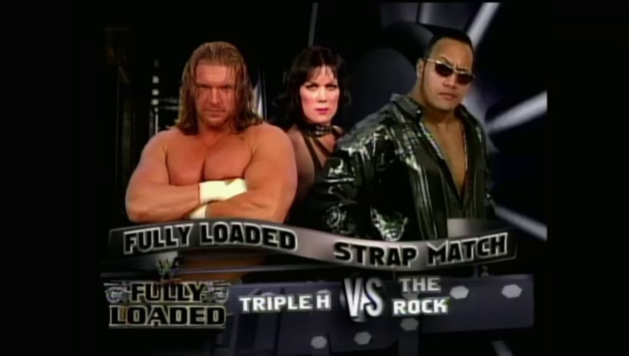 Triple H w/Chyna vs The Rock Fully Loaded Strap Match Number One ...