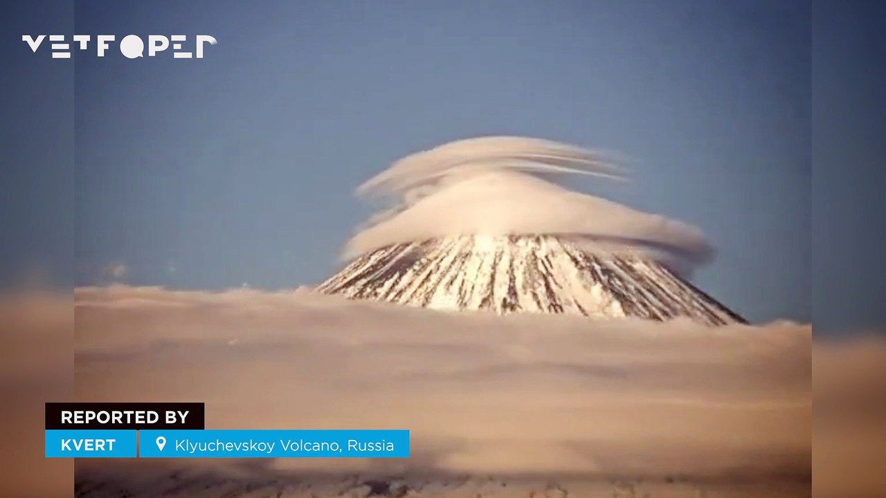 A stunning lenticular cloud forms over Klyuchevskoy Volcano, Russia ...