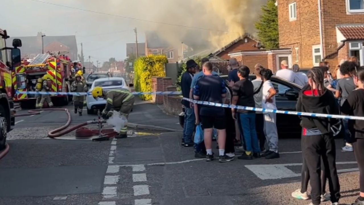 House fire in Alvaston, Derby draws a crowd as firefighters work to ...