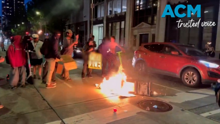 Fires lit, cars harassed in chaotic scenes from Seattle 'No Kings ...