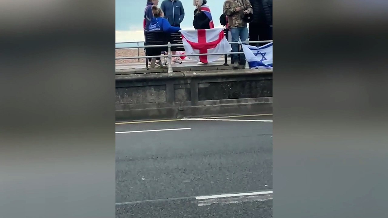 WATCH: Man standing on Southsea Esplanade with his right arm raised ...