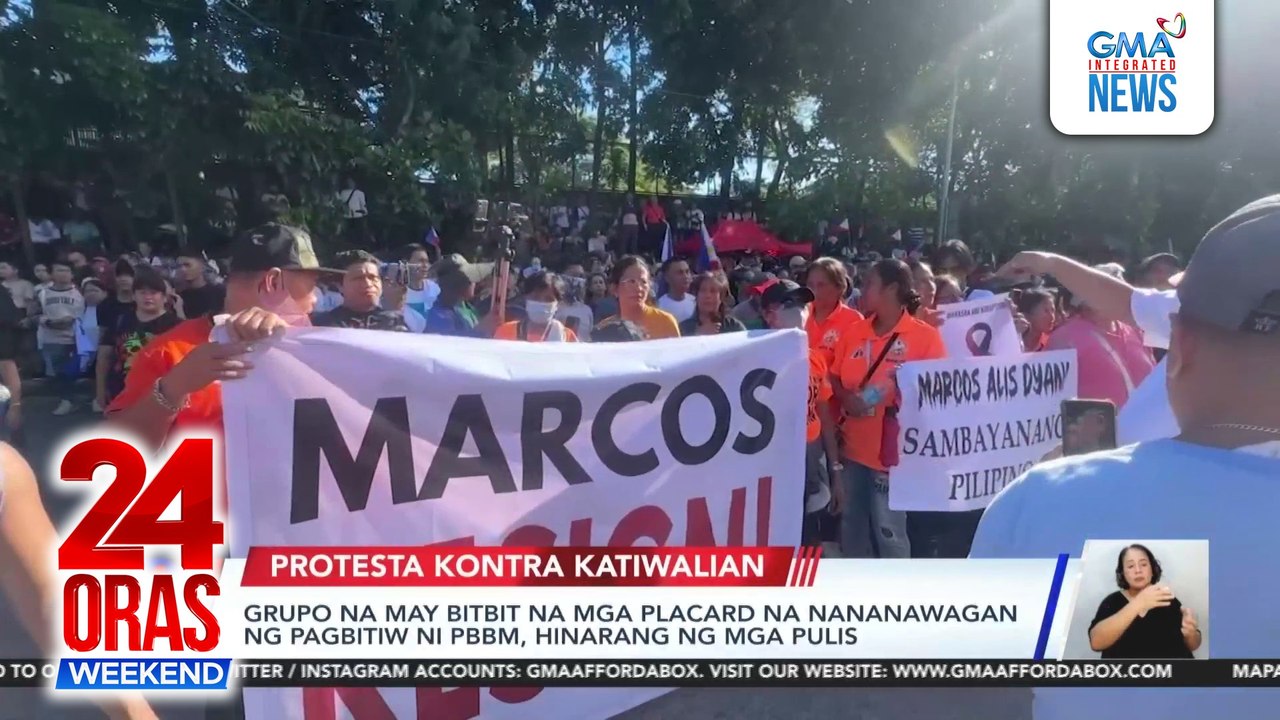 Grupo na may bitbit na mga placard na nananawagan ng pagbitiw ni PBBM ...