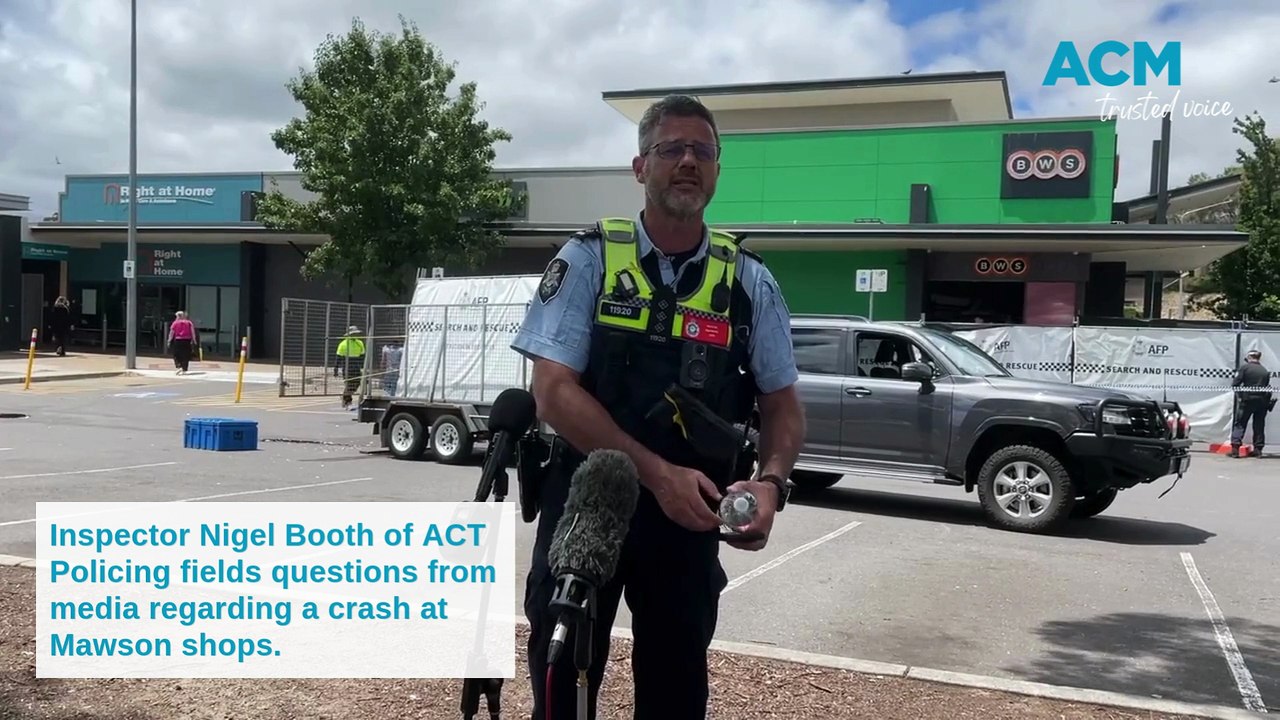 Inspector Nigel Booth of ACT Policing discusses a crash at Mawson shops ...