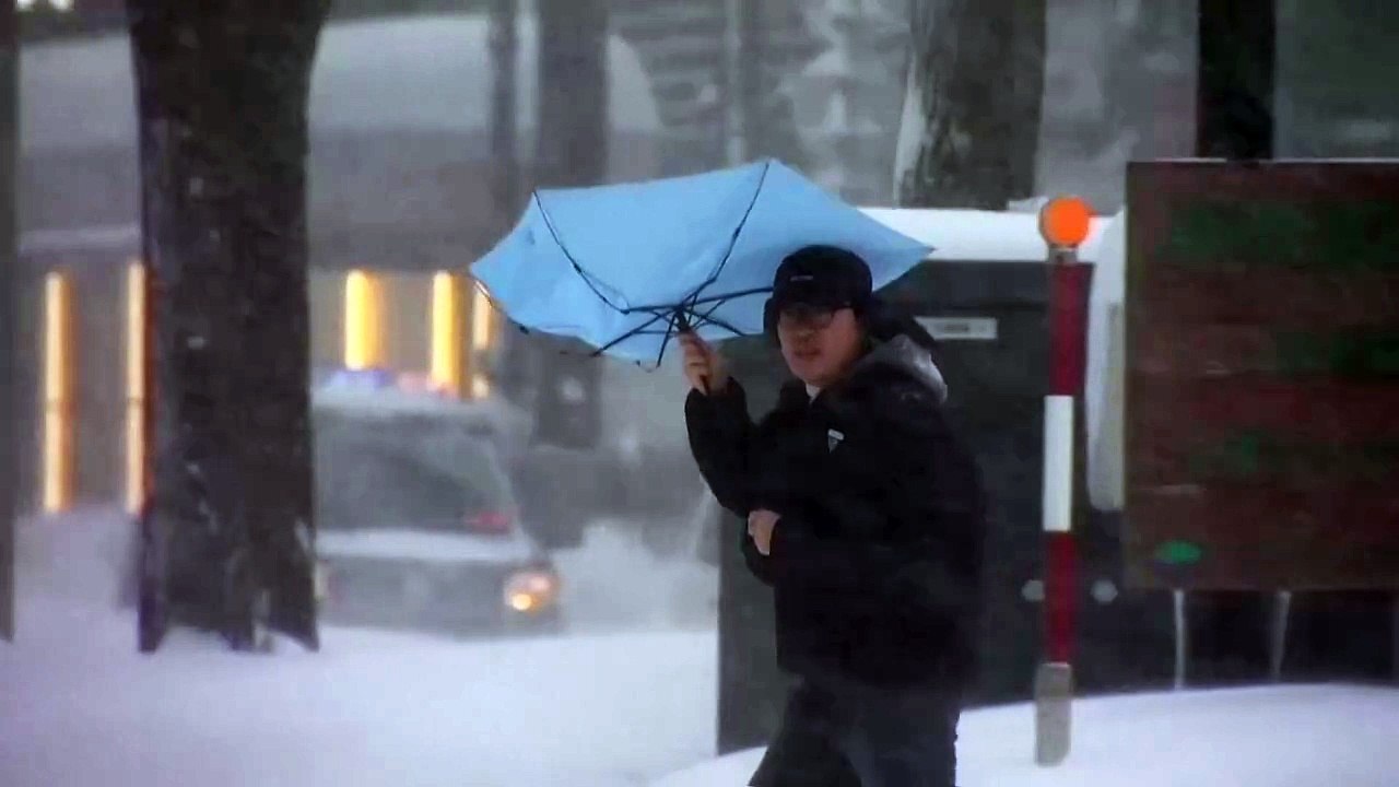 Record snow buries roads and grounds flights in northern Japan - video ...
