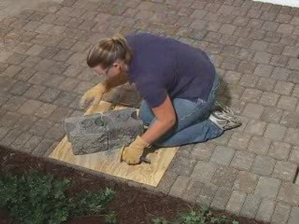 Techniques for splitting concrete blocks for landscape patio - video ...